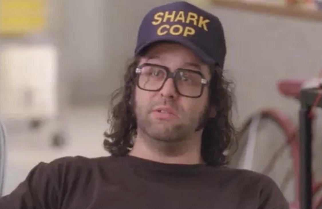 Frank Rossitano SHARK COP Trucker Hat - 30 Rock - PYGear.com